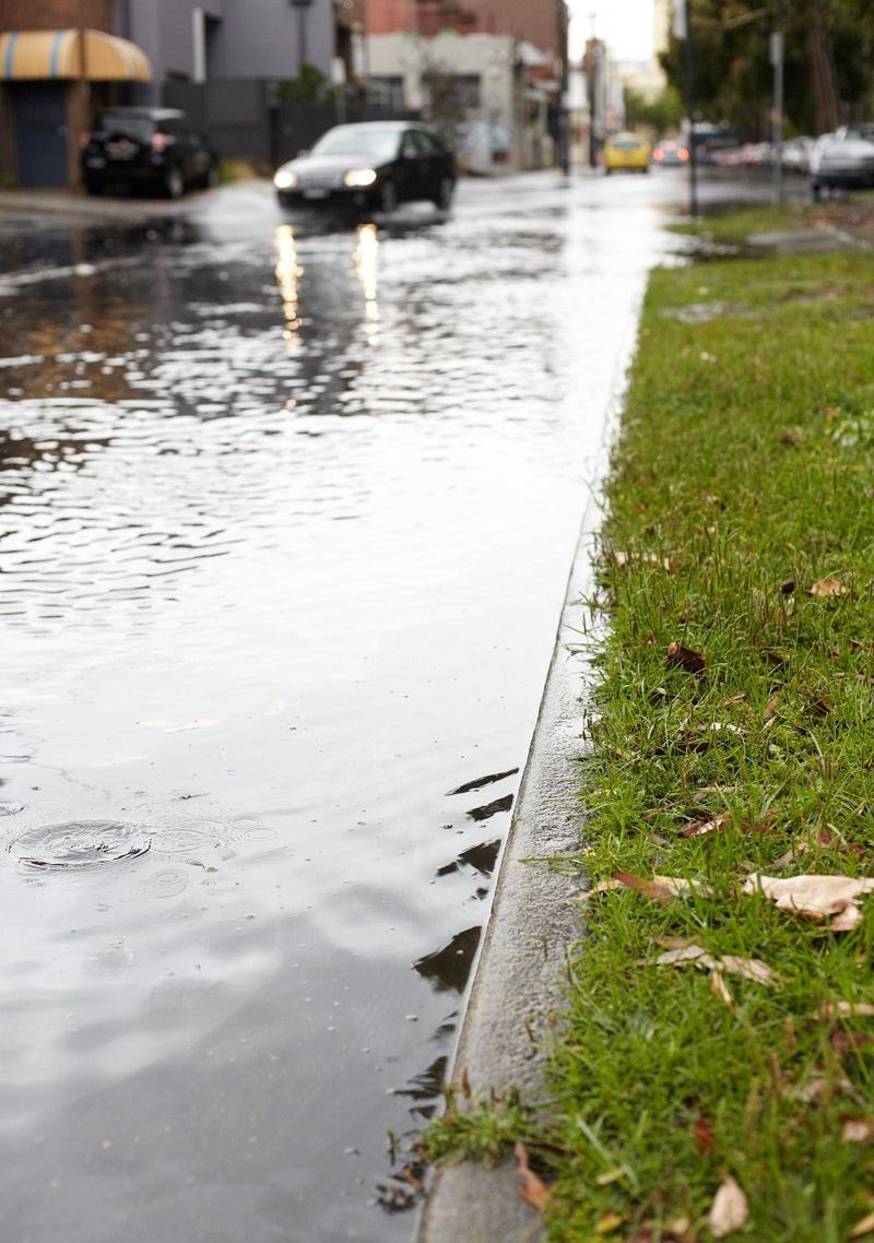 Flooded street gutter | Melbourne Water